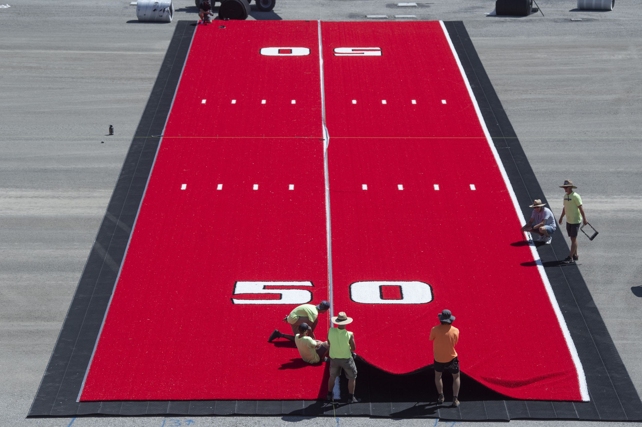 Eastern Washington begins installation of new red turf at Roos Field