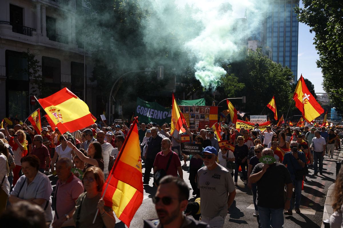 Tens of thousands march in Madrid to demand prime minister's resignation