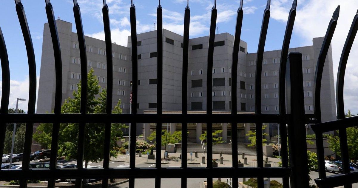 How many detainees at SeaTac prison are separated from children ...