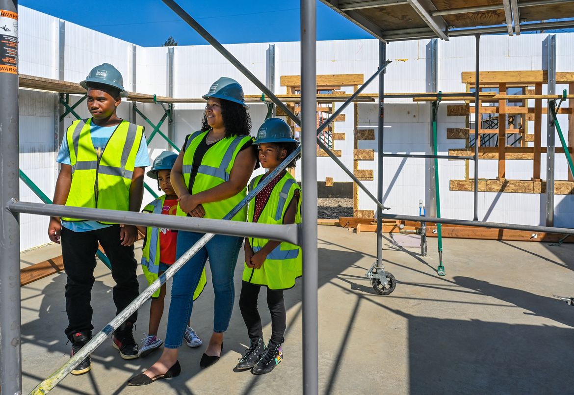 Single mother of three buys innovative house through new Habitat for ...