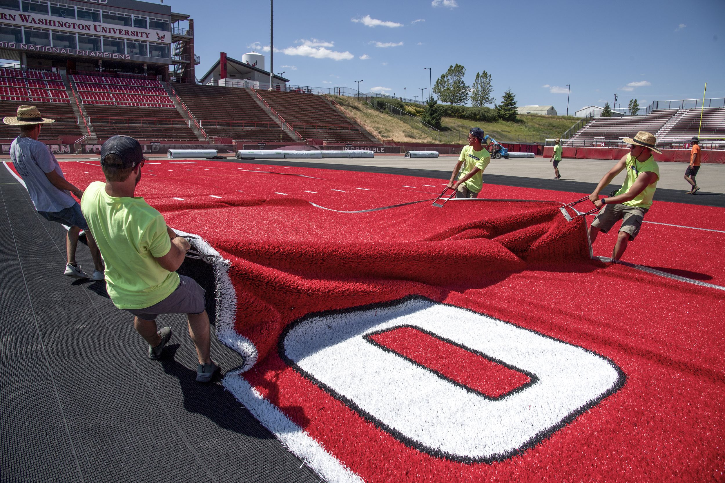 Roos Field red turf installation - July 21, 2020 | The Spokesman-Review
