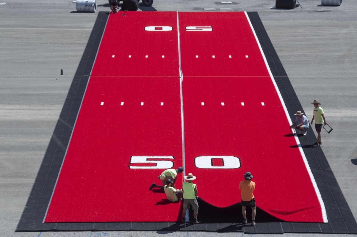 Roos Field red turf installation - July 21, 2020 | The Spokesman-Review