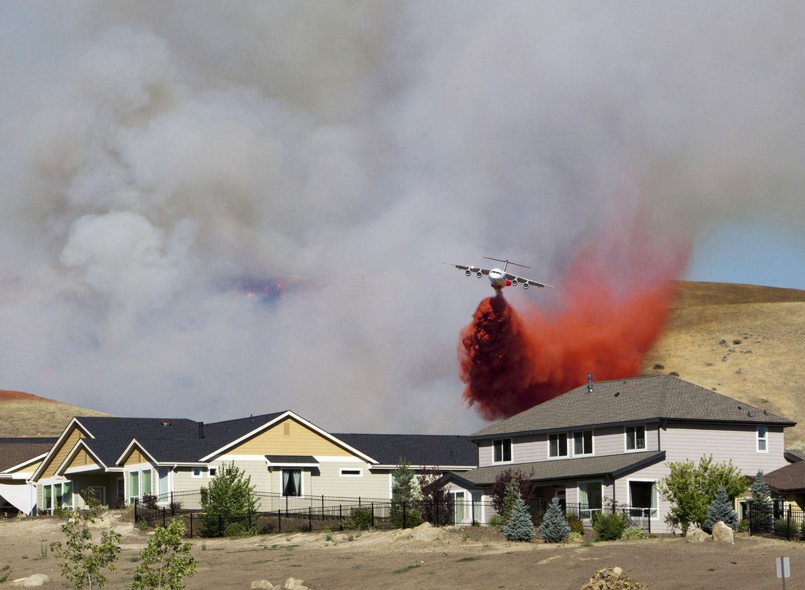Double burnout starts to stop fire from reaching Idaho town | The ...
