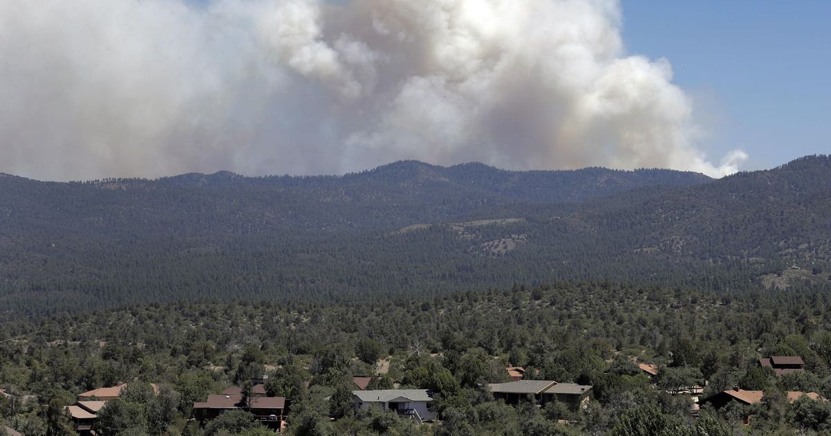 Thousands in Arizona flee flames as wildfires sweep West | The ...